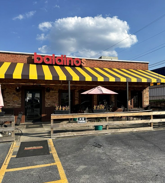 Those yellow and black stripes are like nature's warning: "Dangerously good sandwiches ahead!" Baldinos' patio umbrellas invite you to enjoy Jersey-style subs under Georgia skies.