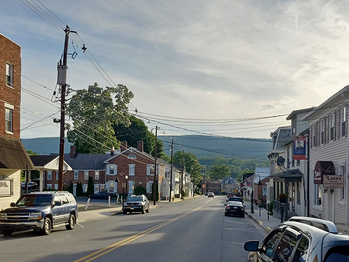 Bedford's main street stretches toward distant mountains, promising adventures just beyond the next traffic light.