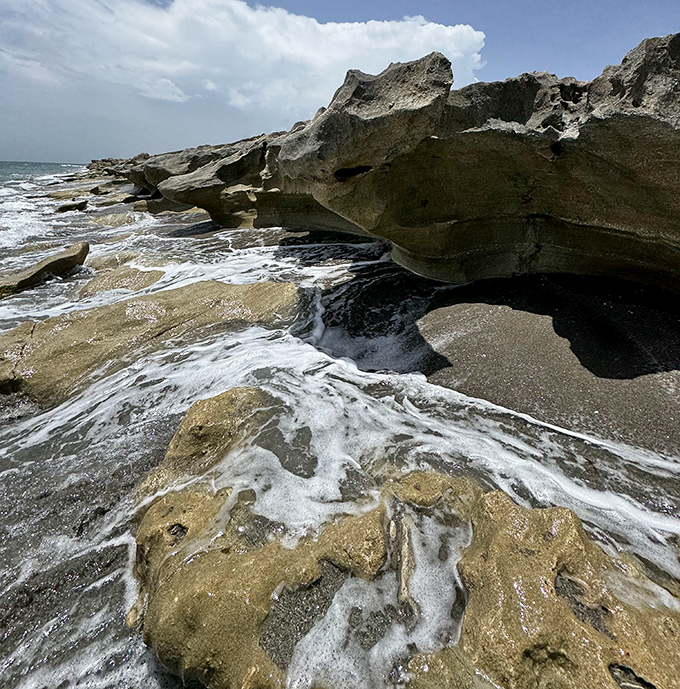 Blowing Rocks turns high tide into nature's fountain show, no coins required for wishes. 