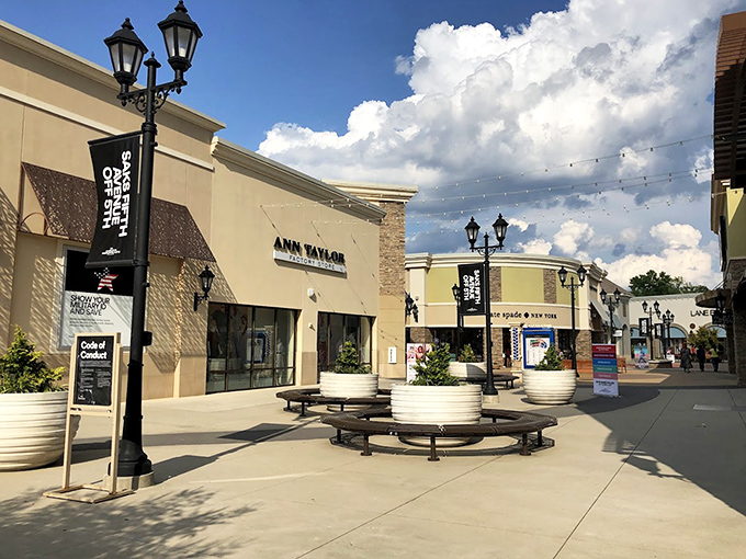Outdoor shopping plazas with comfortable seating areas prove that retail therapy works best with fresh air.