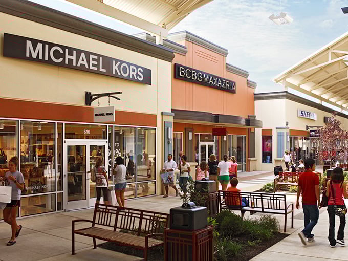 Michael Kors knows how to make an entrance - that pink storefront is practically winking at you. 