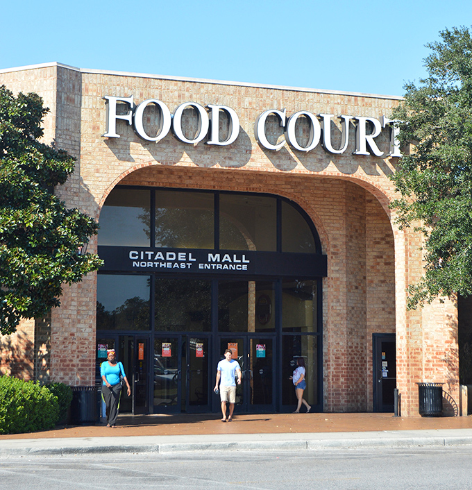 "FOOD COURT" never looked so inviting—Citadel Mall's brick archway promises shopping sustenance for the retail marathon ahead.