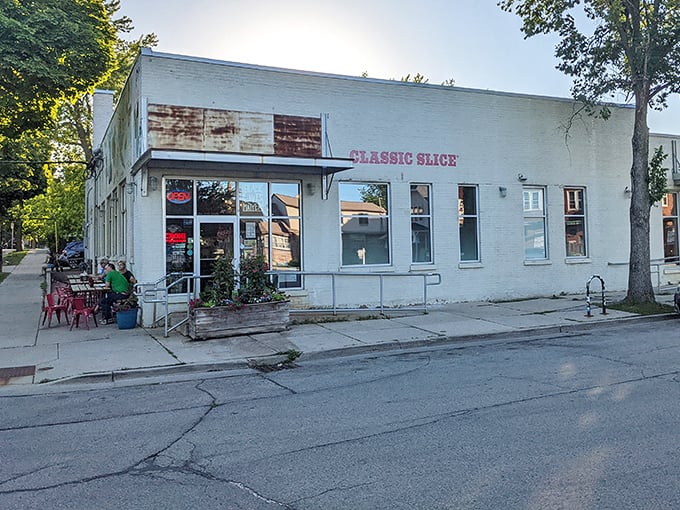 White walls and big windows let the pizza do all the talking here.