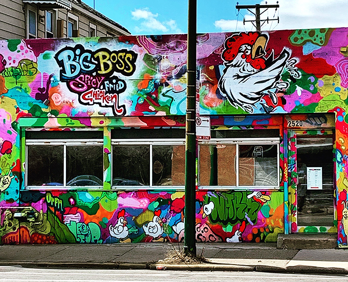 This vibrant mural screams "we're not your average chicken joint" louder than a rooster.