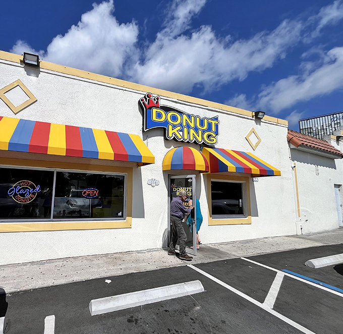 Carnival colors and royal treatment! Donut King's circus-like awnings promise a three-ring circus of flavor inside.