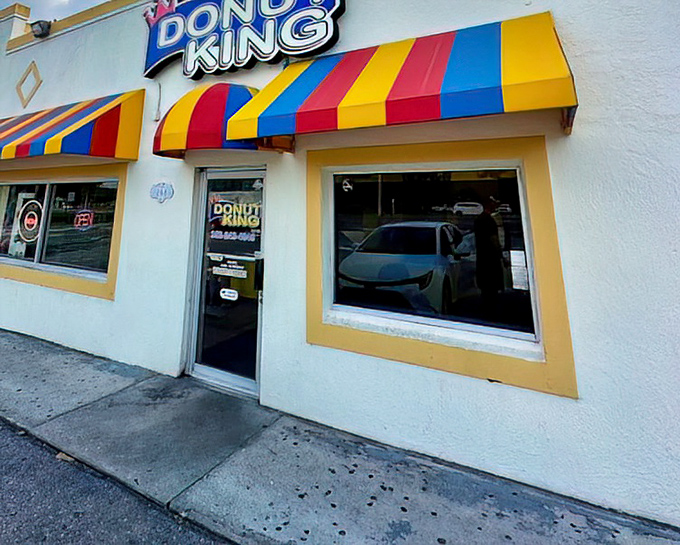 Rainbow stripes on the awning hint at the colorful variety of glazed treasures waiting inside this kingdom.