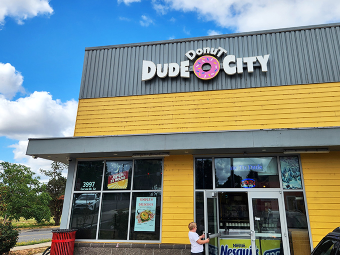 Dude Donut City's bright yellow and black exterior makes a bold statement in Salem. The playful name and colorful building promise donuts with personality.