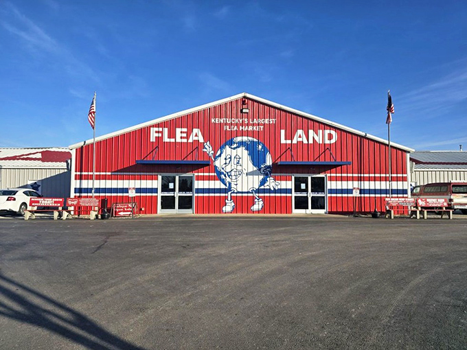Flea Land's cartoon mascot grins from the bright red building. This flea doesn't bite&mdash;unless you count the bite it takes from regular retail prices!