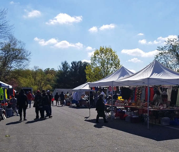 Church steeples and white tents create an unlikely but perfect pairing for community commerce and neighborly connections.