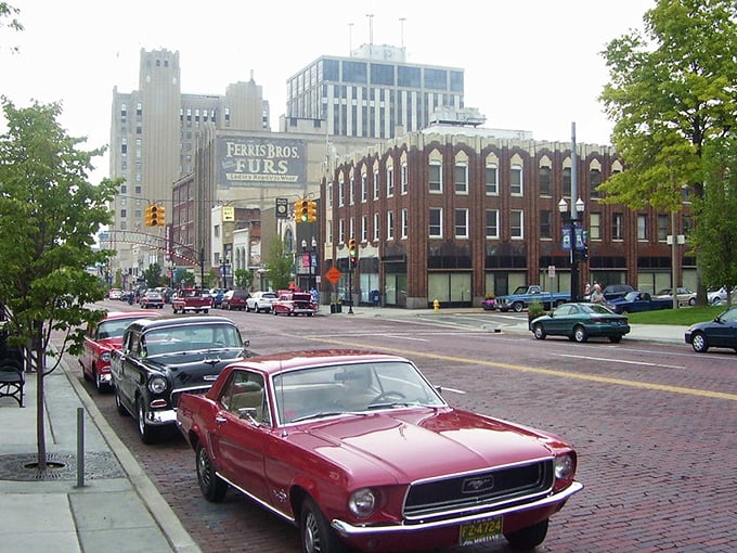 Classic cars cruise downtown Flint like a scene from "American Graffiti" - pure automotive nostalgia.