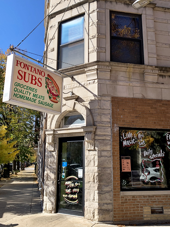 Fontano's vintage corner sign promises three essential food groups: subs, groceries, and homemade sausage.