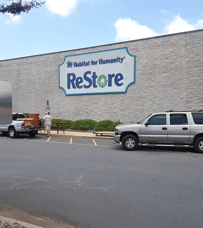 The massive Habitat for Humanity ReStore sign dominates this Charlotte building. Every purchase here helps build homes and hope for families in need&mdash;shopping with purpose!