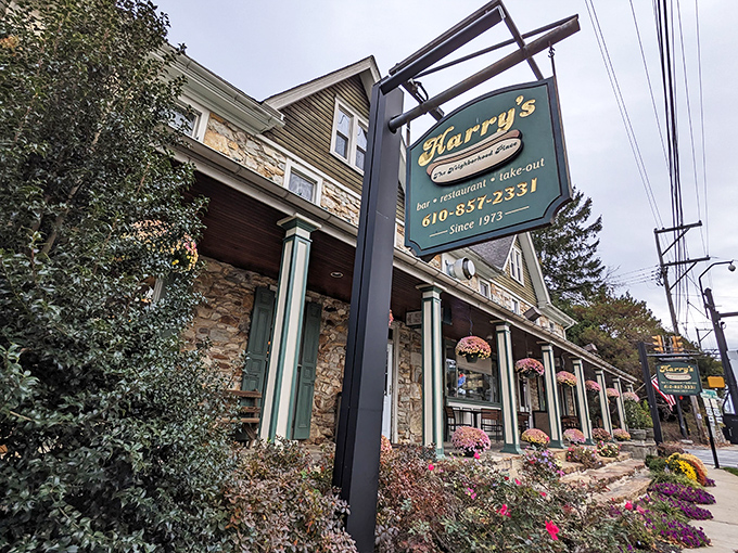 Harry's stone exterior looks like it belongs in a fairy tale, but the hot dogs inside are the real happily-ever-after. Those flower boxes aren't the only things blooming here.