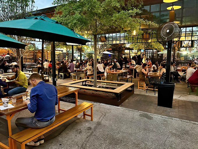 Heights Bier Garten's thoughtful design brings greenery and gathering spaces together - an urban oasis for beer enthusiasts.