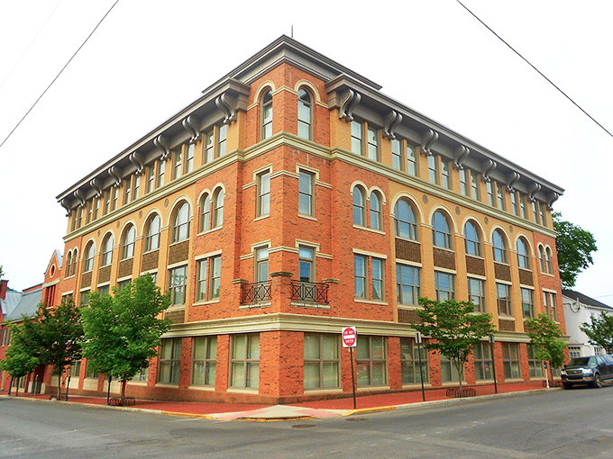 A beautifully preserved historic building with classic brickwork and arched windows, showcasing the charm of small-town America.