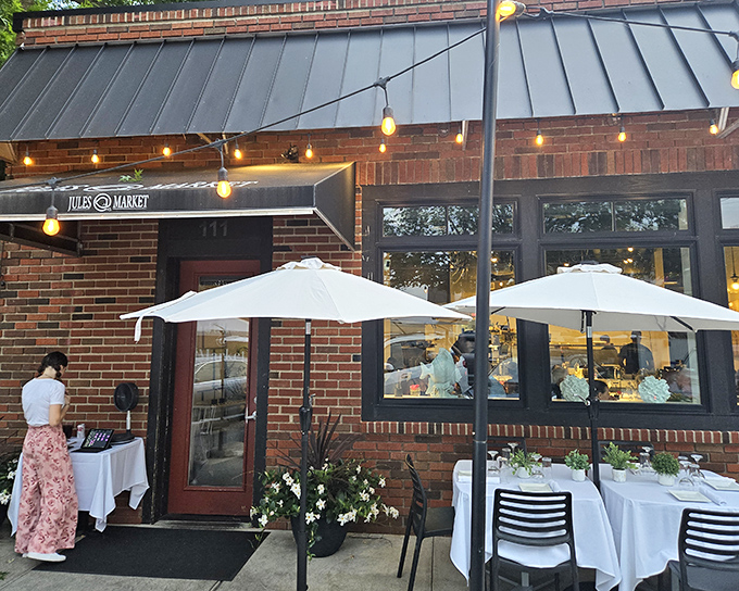 White tablecloths under market lights create seafood magic. The kind of place where memories are made between incredible bites.