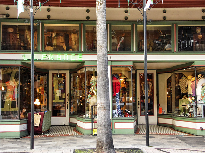La France's elegant storefront displays vintage treasures like jewels in a sophisticated European-style window showcase.