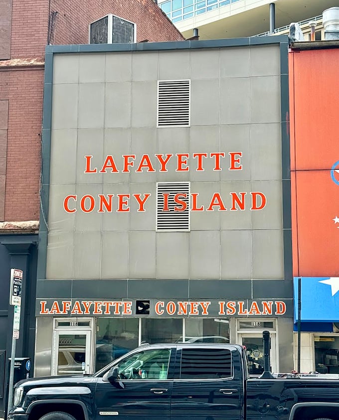 In Detroit's concrete jungle, this modest storefront stands as a temple to the perfect coney dog.