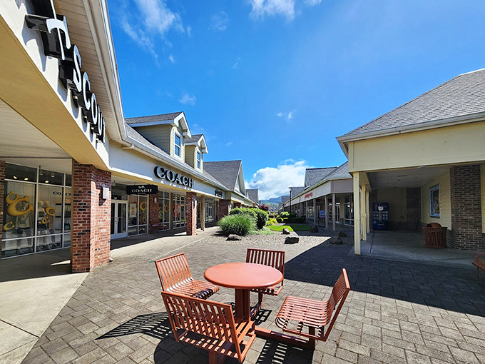  Coach and luxury brands create an upscale outlet village atmosphere for discerning shoppers everywhere.