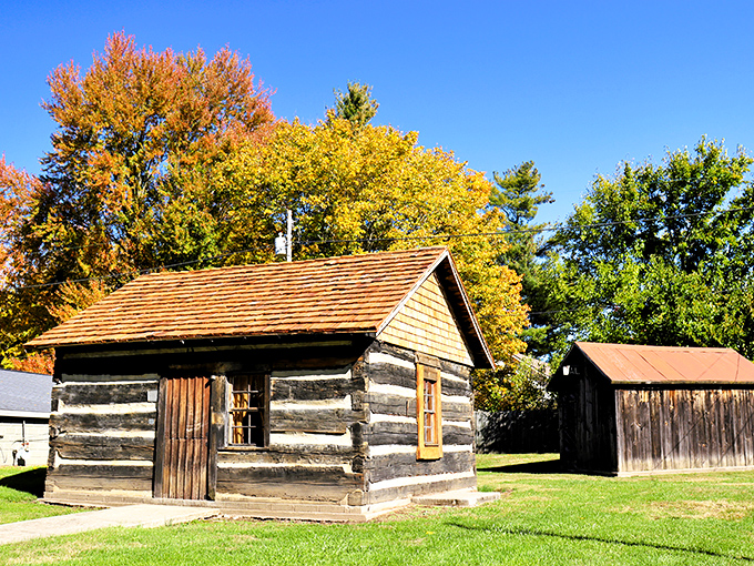 This authentic log cabin looks like it was plucked straight from a history book&mdash;surrounded by autumn's golden palette.