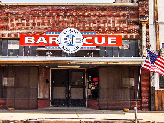 Louie Mueller's weathered brick walls have absorbed decades of smoke, creating barbecue history with every breath.