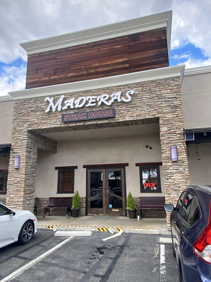 Maderas combines stone and wood for an exterior as carefully crafted as their prime cuts. Rustic elegance at its finest!