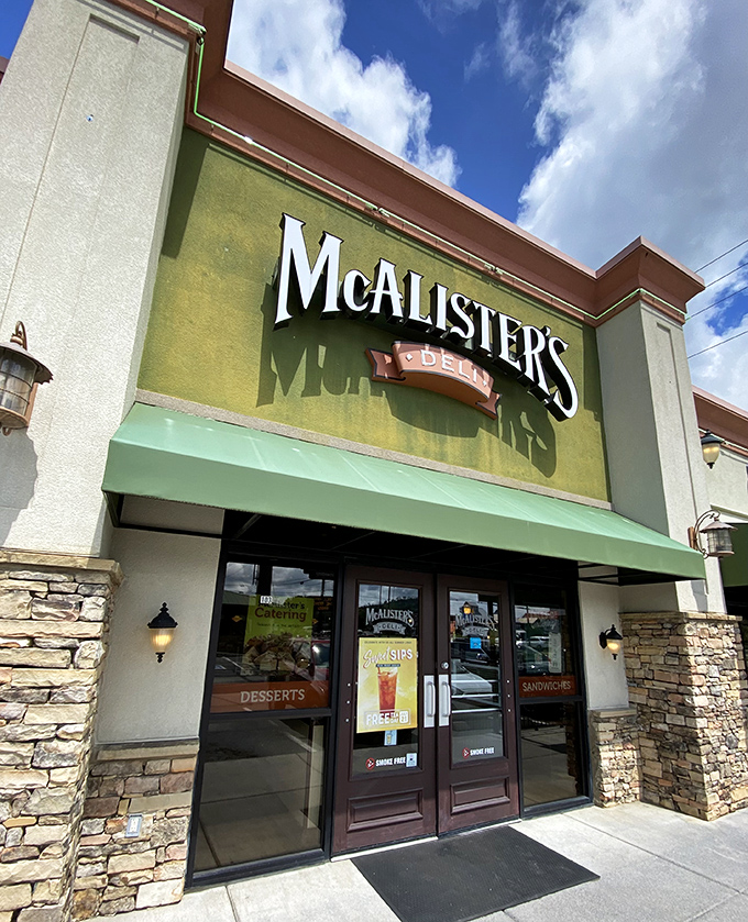 Stone accents and warm lighting create an inviting atmosphere for serious sandwich appreciation.