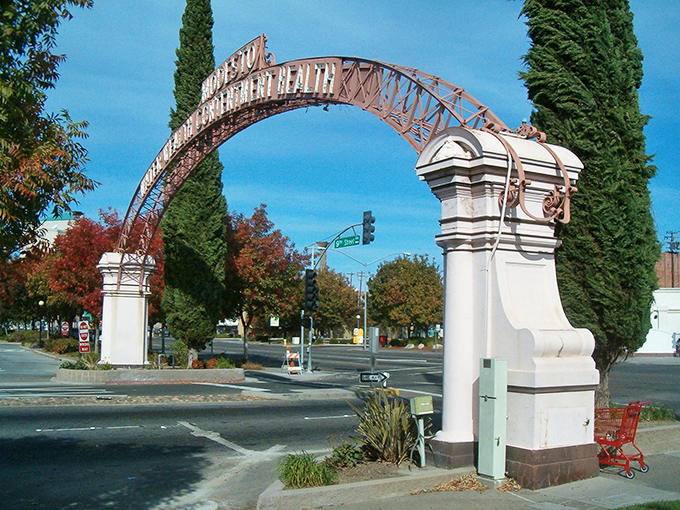 Modesto's welcoming arch stands like a gateway to affordable living, beckoning retirees to discover hidden treasures.