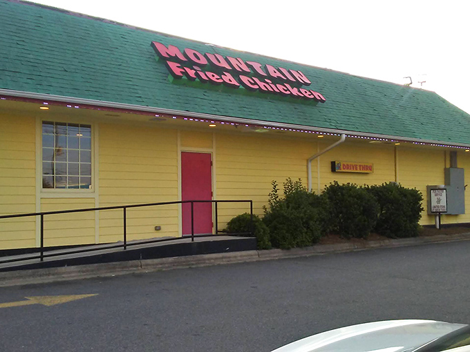 Mountain Fried Chicken's cheerful yellow exterior radiates the kind of warmth that draws families together.