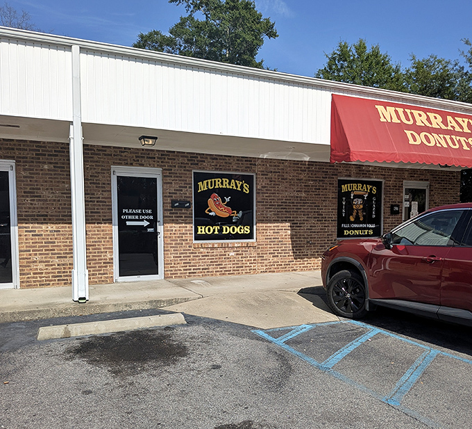 Red awning alert! Murray's classic brick building houses both donuts and hot dogs—the dynamic duo of comfort foods.