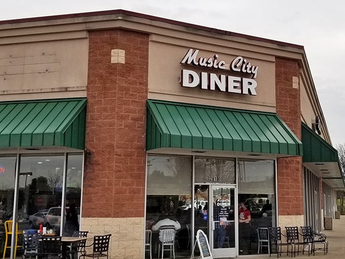 Modern diner, timeless flavors. Those green awnings shade tables where memories are made over steaming plates of breakfast.