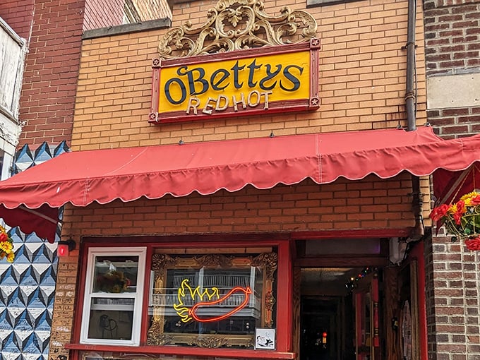 That ornate sign and red awning create old-world charm that would make any European café jealous.