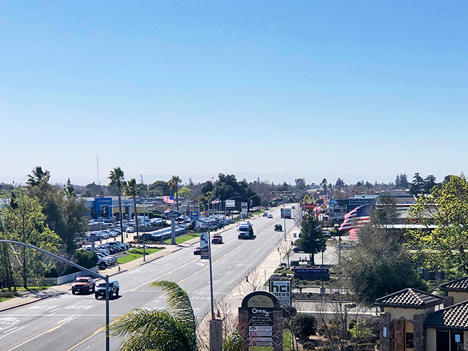 Oakdale's main drag&mdash;where the horizon stretches further than your retirement savings and golden California light makes even fast food signs look poetic.