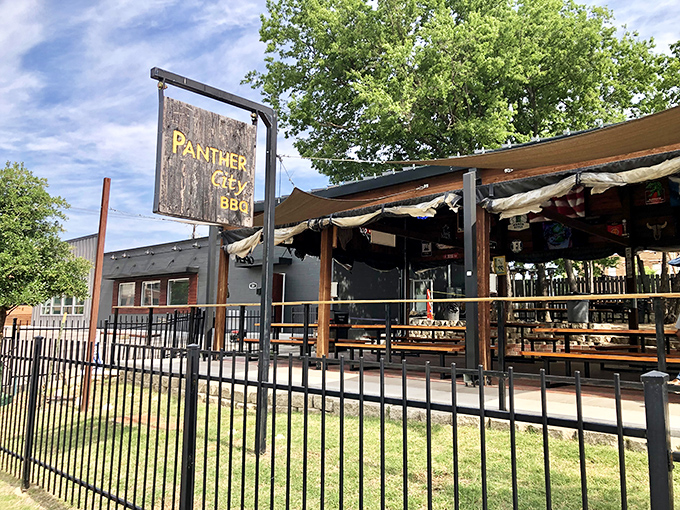 Panther City's wooden sign swinging in the Fort Worth breeze is like a friendly wave saying, "Get in here, you're hungry!"
