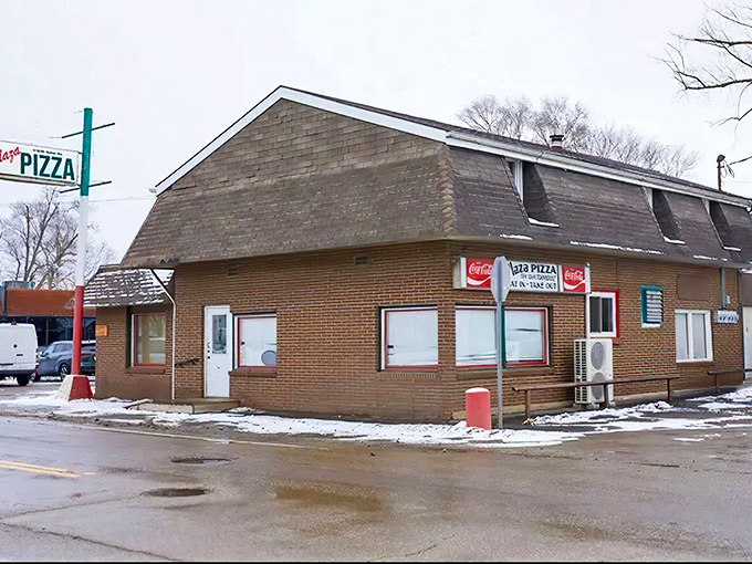 Sometimes the most ordinary-looking buildings house the most extraordinary pizza experiences waiting inside.