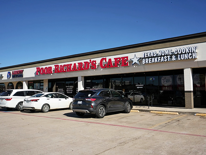 Poor Richard's Cafe boldly announces its Texas-sized breakfast ambitions with a sign that's impossible to miss.