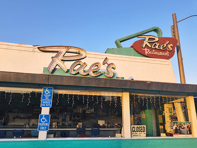 That turquoise facade screams "vintage cool" louder than a 1950s jukebox playing breakfast songs.