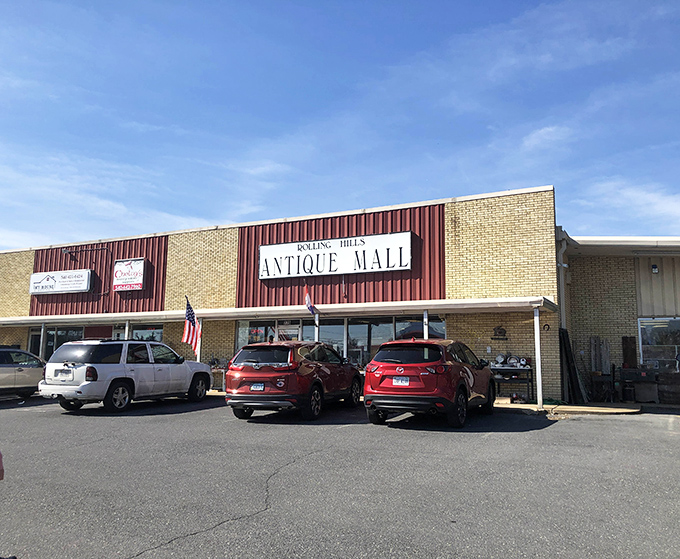 Rolling Hills Antique Mall sits pretty against Virginia's blue skies. Red trim, tan walls, endless possibilities inside.