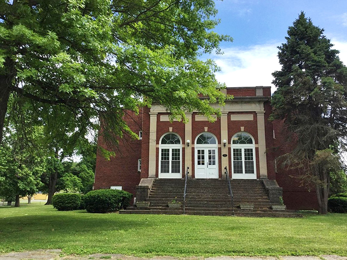 This stately brick building in Russellville houses community gatherings where neighbors become friends without expensive membership fees.