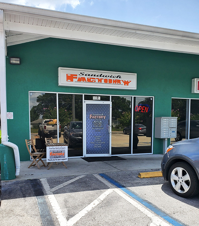 Sandwich Factory's industrial-chic metal door lists their specialties like a delicious treasure map to flavor country.