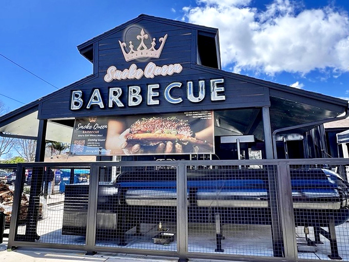 Smoke Queen's bold black building crowned with royal insignia makes a statement before you even taste their championship-worthy BBQ.