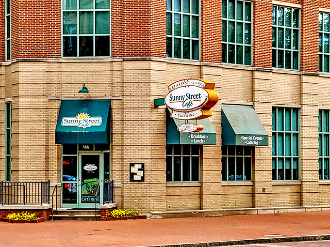 Sunny Street's bright signage against classic brick architecture promises breakfast sunshine, rain or shine.