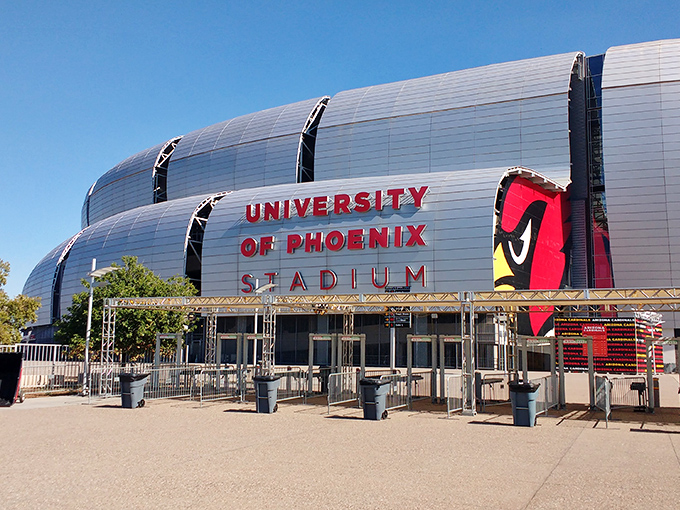 University of Phoenix Stadium towers nearby, reminding shoppers that winning deals require championship-level dedication.