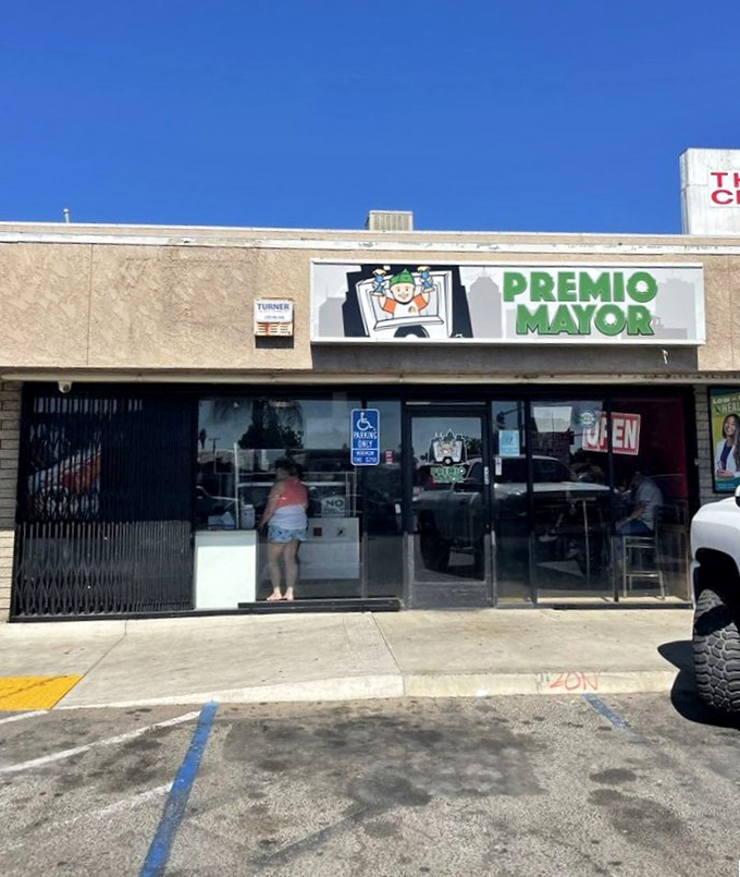 The "Premio Mayor" name isn't just talk - this humble storefront delivers championship-level tacos that earn every accolade.