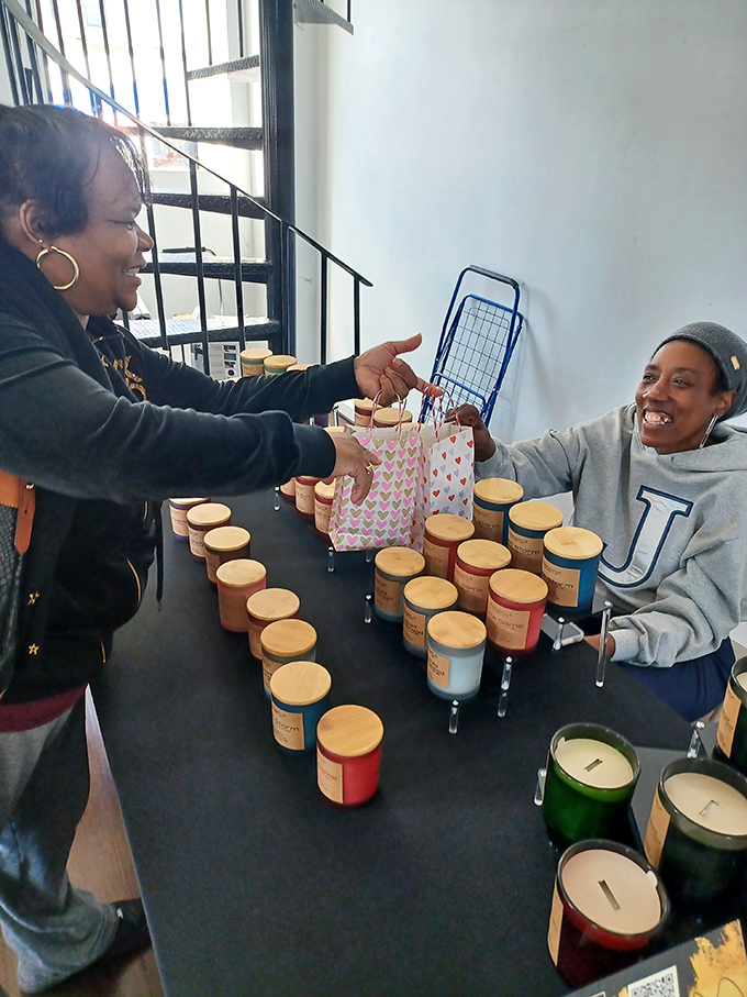 Local entrepreneurs showcase handmade candles and crafts in spaces celebrating creativity and community entrepreneurship together.