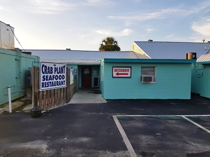 The Crab Plant's turquoise exterior stands out like a beacon for seafood lovers searching for their next great meal.