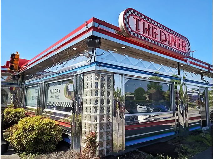 This shiny chrome diner gleams like a promise of crispy hash browns and bottomless coffee cups.