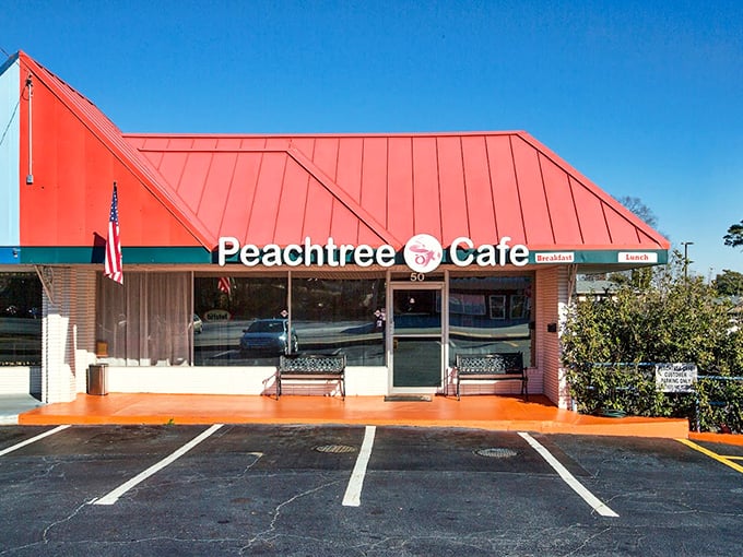 That cheerful red roof acts like a beacon for anyone craving honest American comfort food.