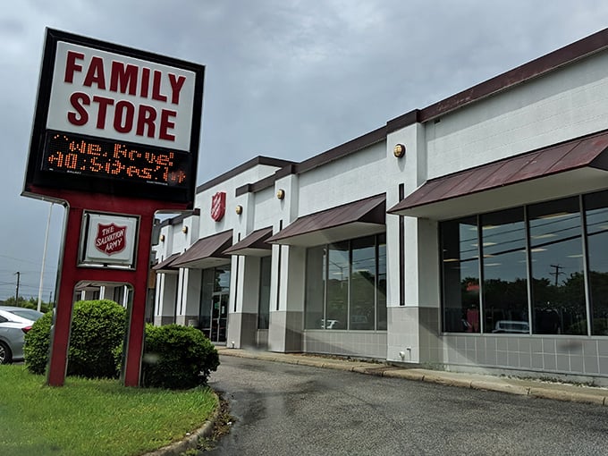 The Salvation Army's crisp red and white facade stands like a retail lighthouse, guiding bargain seekers safely to shore.
