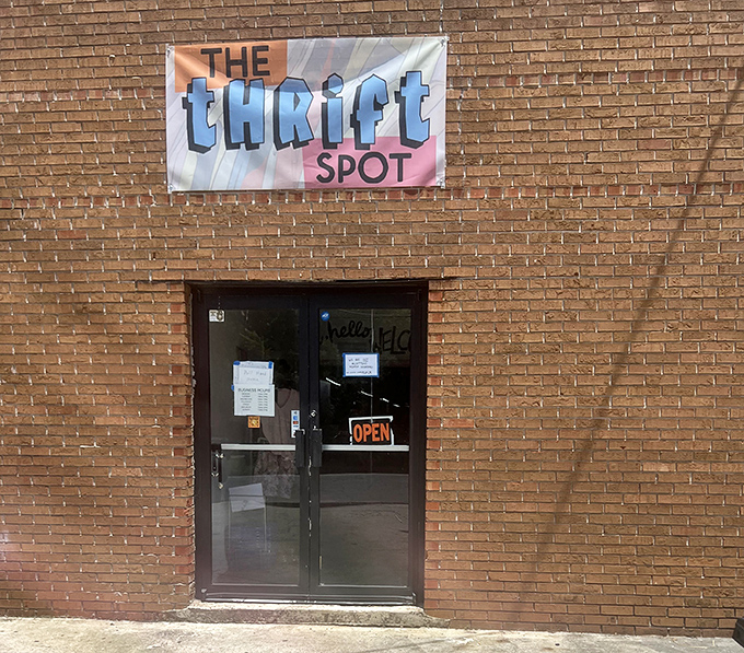 The Thrift Spot's brick exterior whispers "hidden gem" to those wise enough to venture inside. 